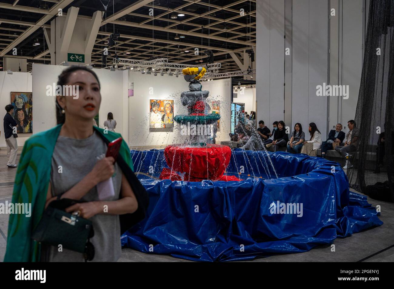 Hong Kong, China. 23rd Mar, 2023. A women walks pass Fountain: Night ...