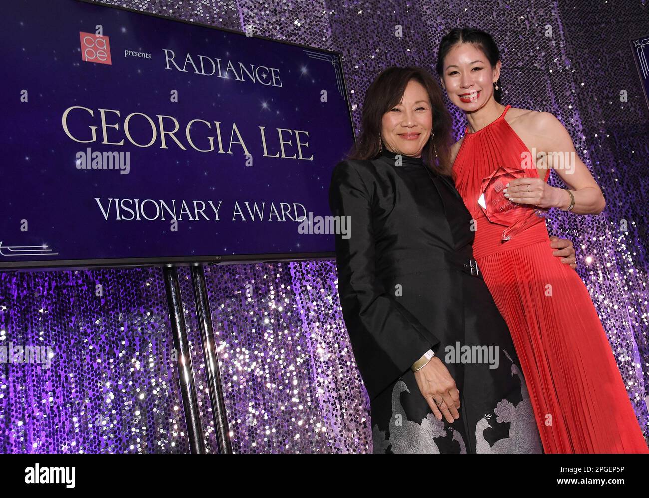 (L-R) Presenter Janet Yang and Visionary Award Honoree Georgia Lee at ...