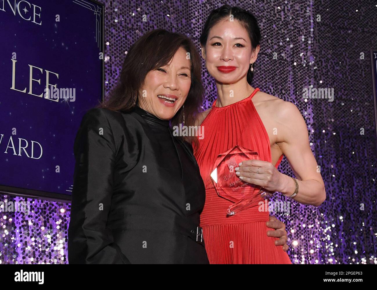 (L-R) Presenter Janet Yang and Visionary Award Honoree Georgia Lee at ...
