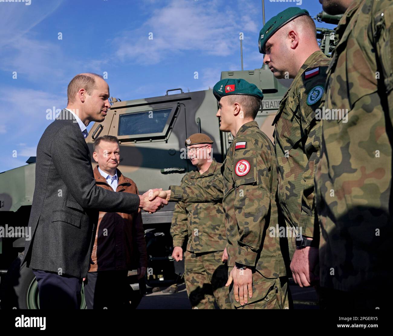 The Prince of Wales (left) meeting members of the Polish military with ...