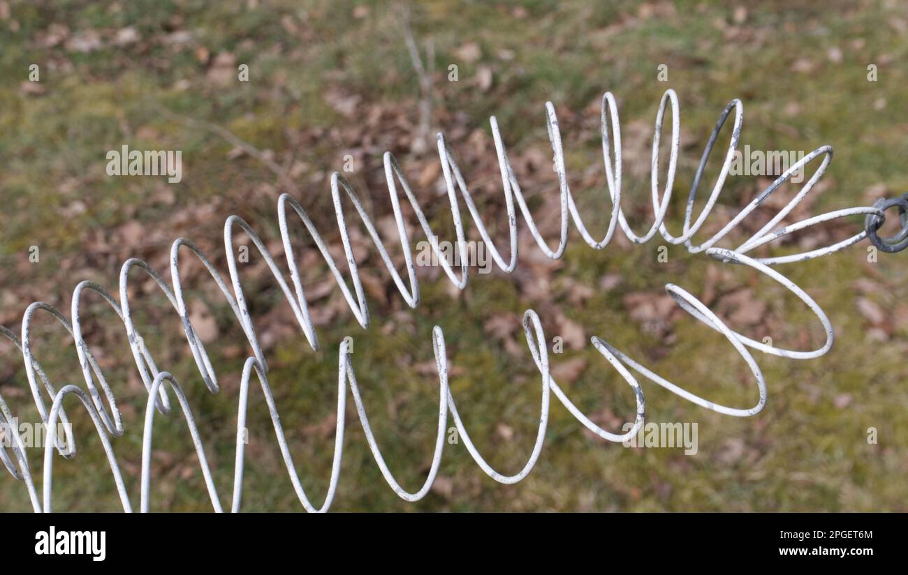 Old agricultural electric fencing wire Stock Photo - Alamy