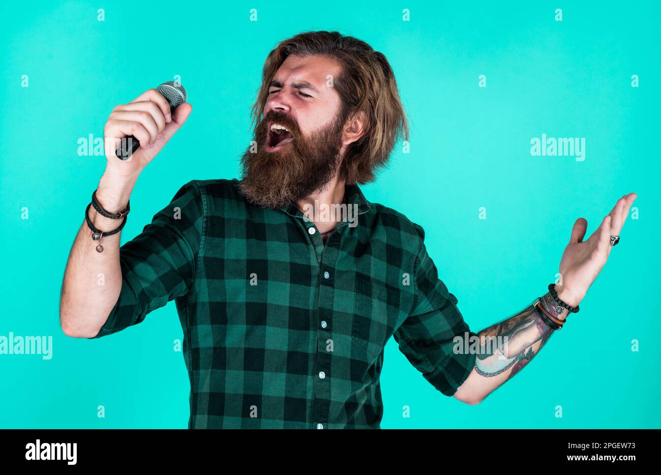 express yourself. bearded man wear checkered shirt singing song. male singer with mic. concept ...