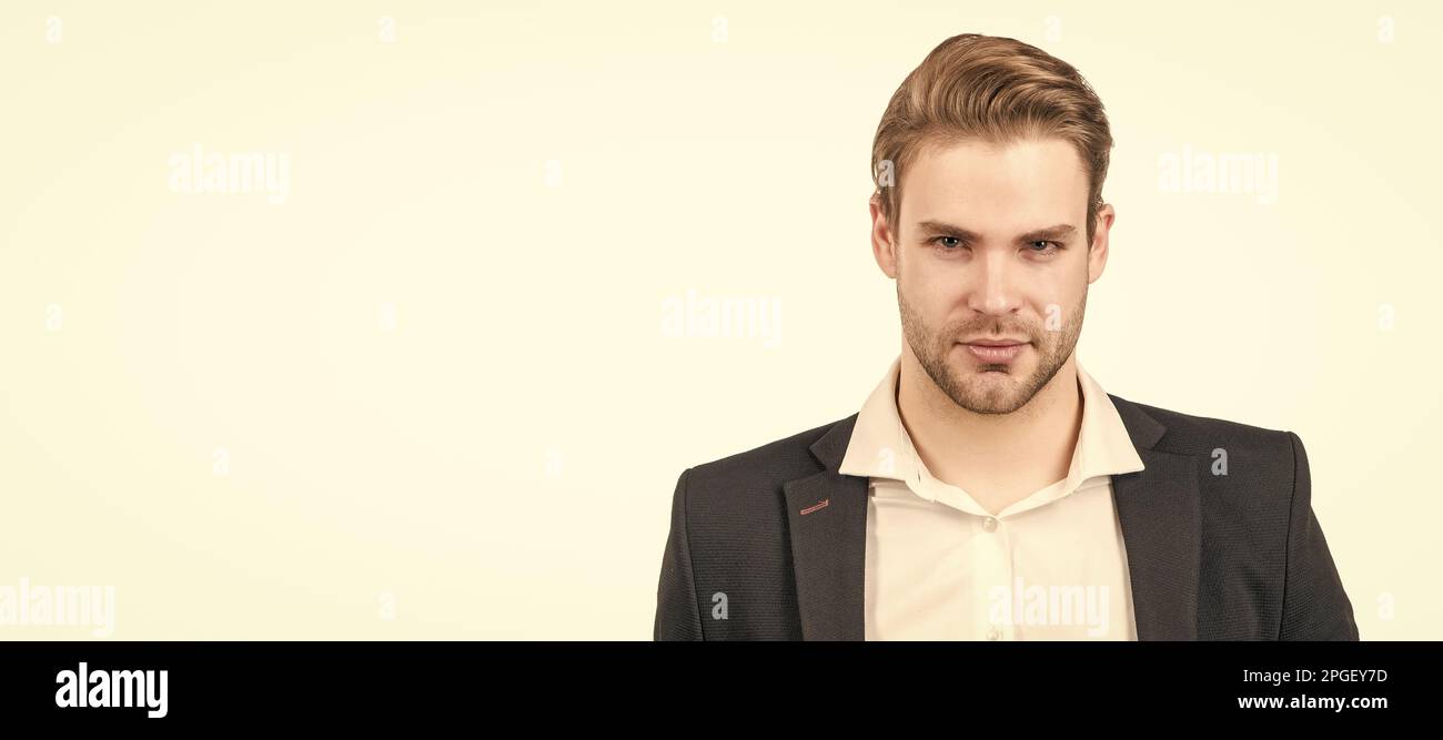 Portrait of serious young professional man in formal business wear ...