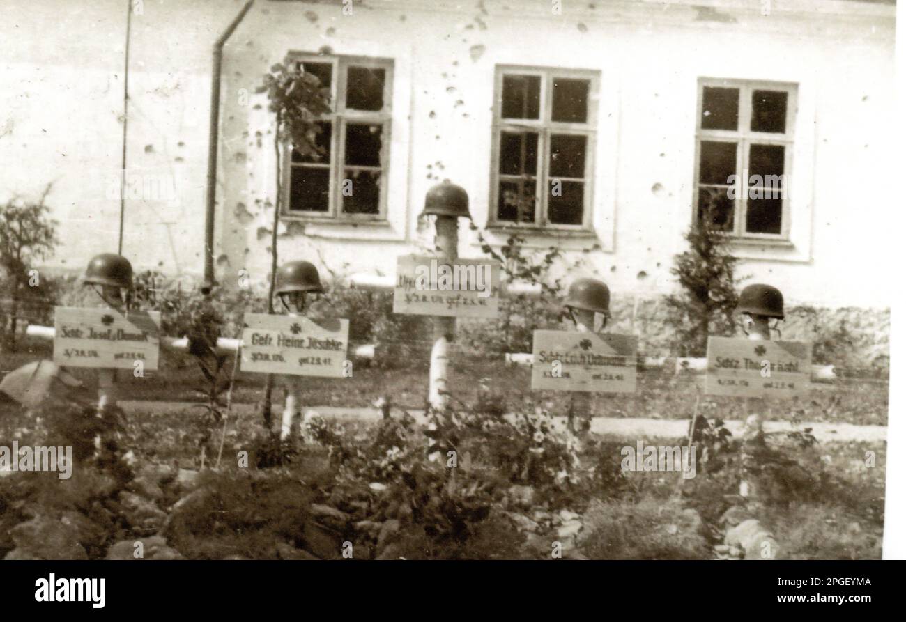 World War Two B&W photo German Army Graves in front of a bullet riddled ...