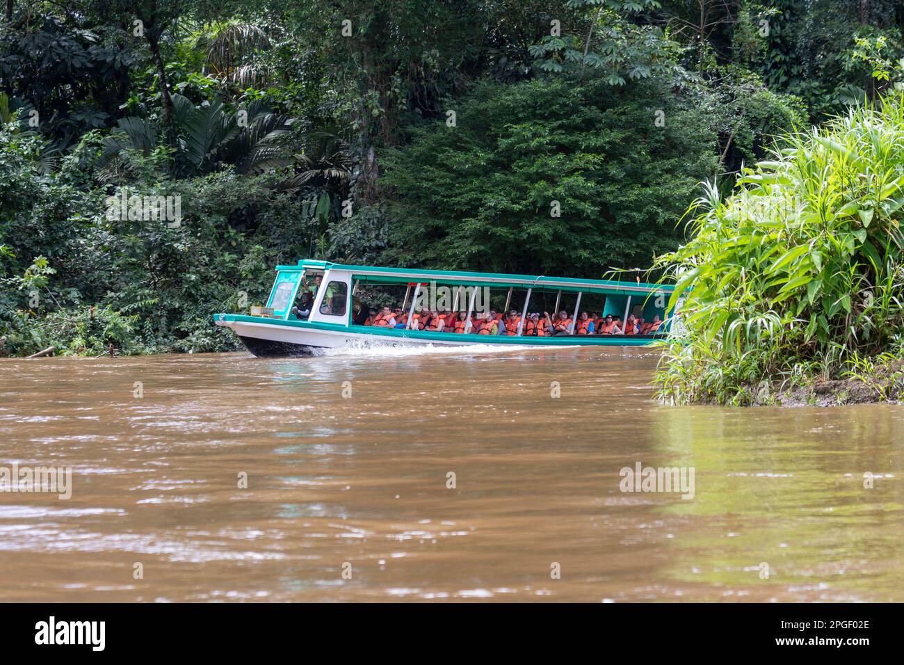 La Pavona, Costa Rica - Tourists ride boats on the Suerte River for the ...