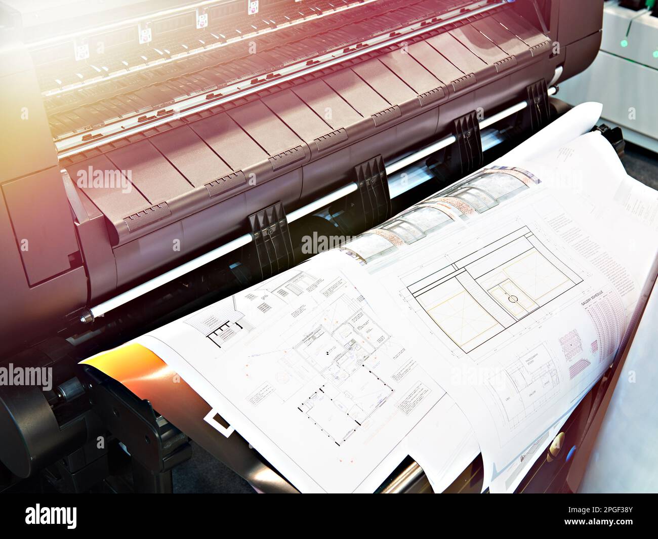 Large format plotter and printed drawings floor plans Stock Photo - Alamy