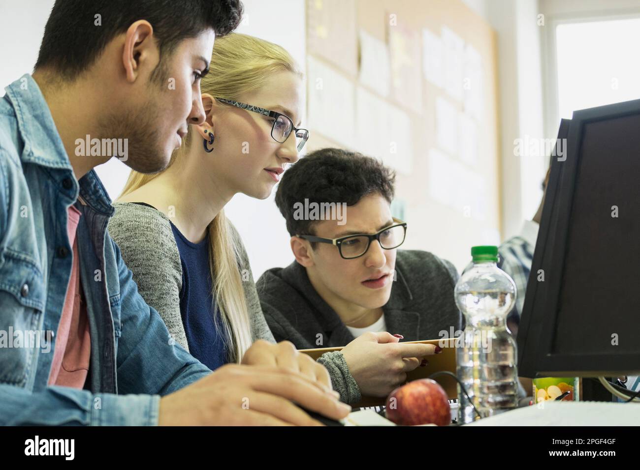 University students studying in computer laboratory School, Bavaria ...