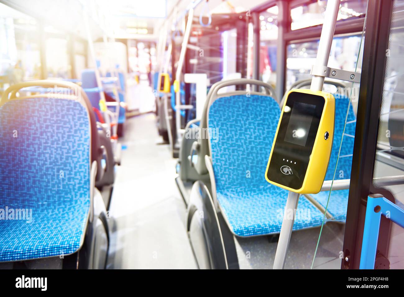 Modern touch payment terminal in bus Stock Photo - Alamy