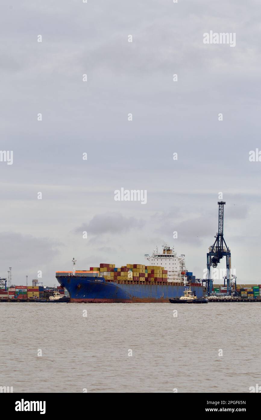 Container ship MSC Mirella leaving the Port of Felixstowe assisted by ...