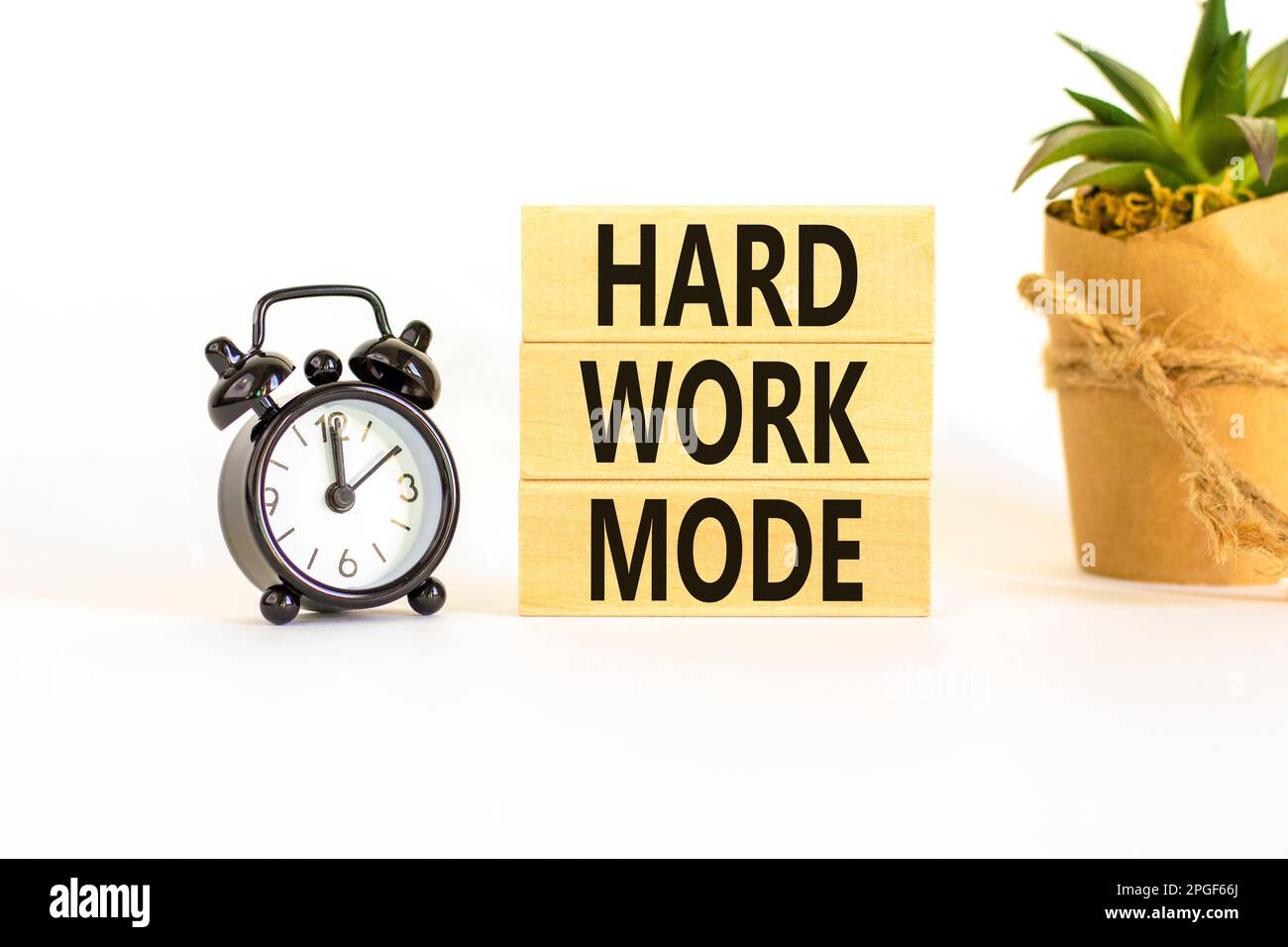 Hard work mode symbol. Concept words Hard work mode on wooden block on ...