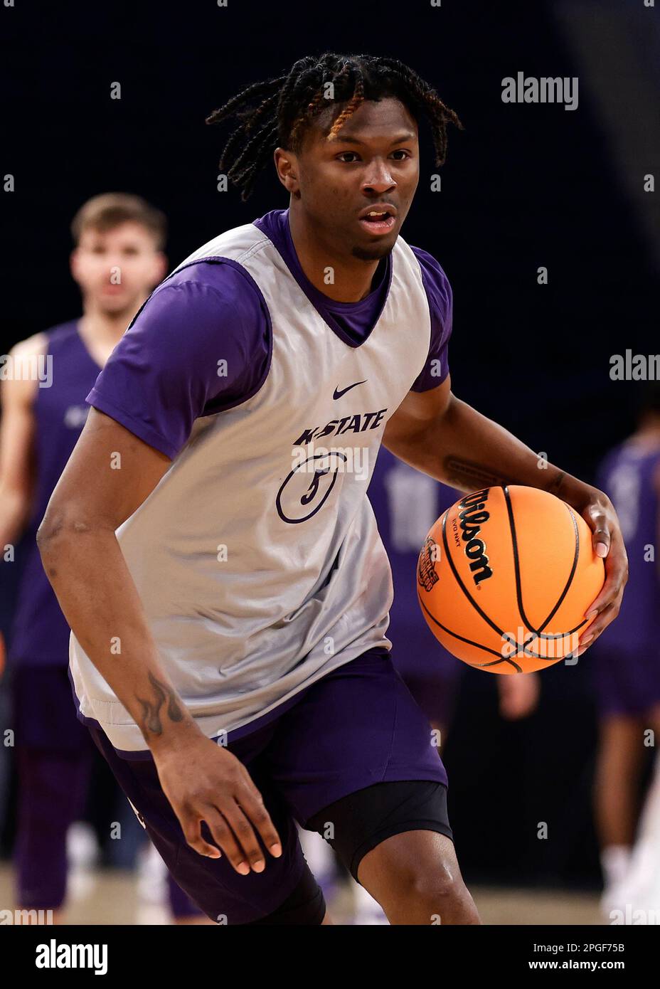 Kansas State guard Cam Carter (5) drives to the basket during practice ...