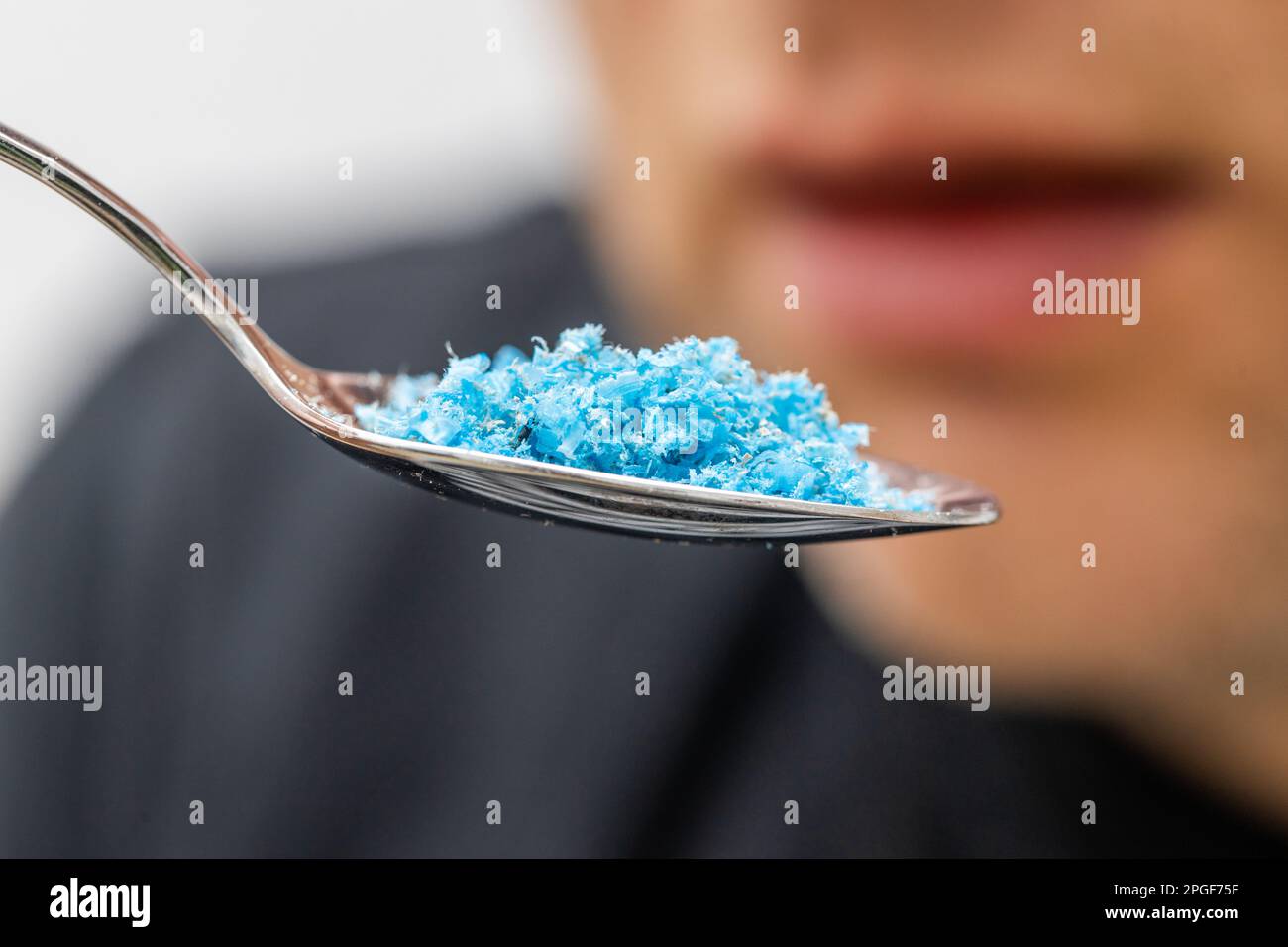 Microplastic in food, Environment and health concept, Person putting a ...