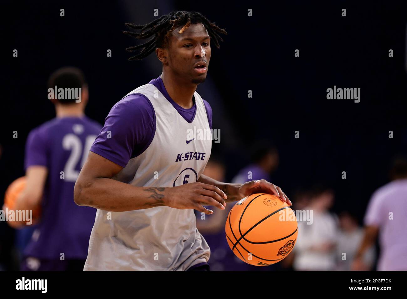 Kansas State guard Cam Carter (5) drives to the basket during practice ...