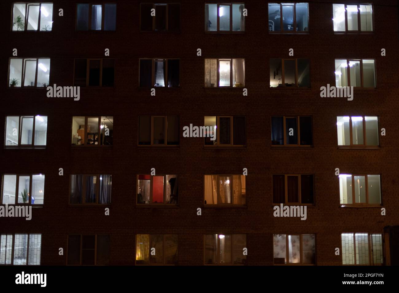Windows in house at night. Light from windows of apartments Stock Photo ...