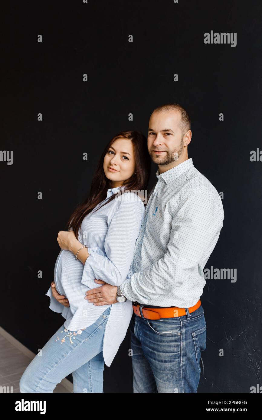 couple expecting a child is experiencing a happy period of pregnancy ...