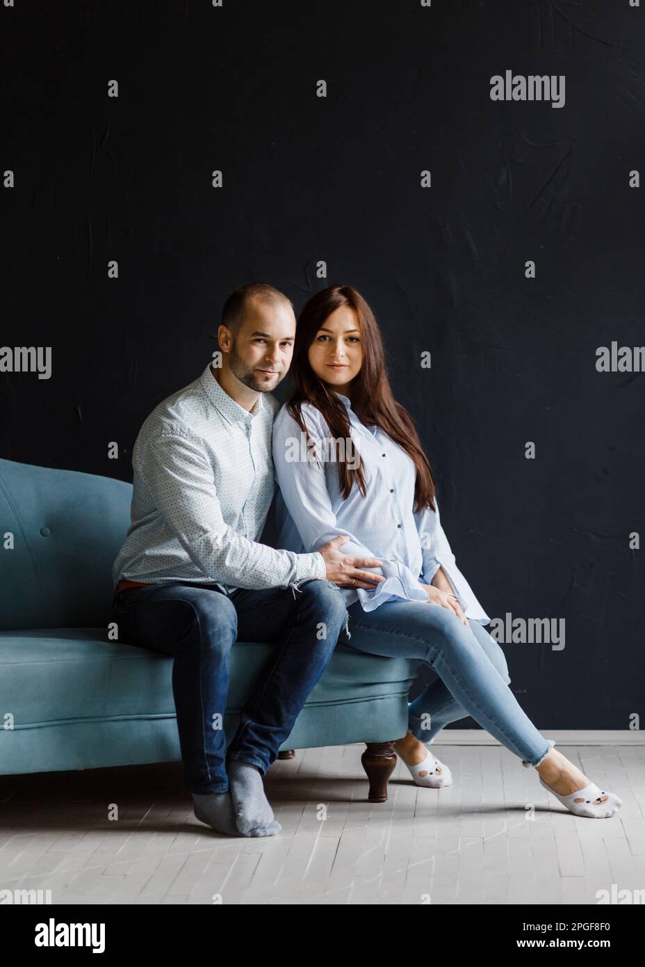 couple expecting a child is experiencing a happy period of pregnancy ...