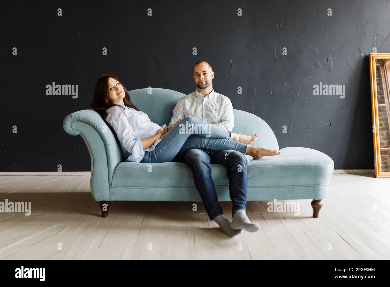 couple expecting a child is experiencing a happy period of pregnancy ...