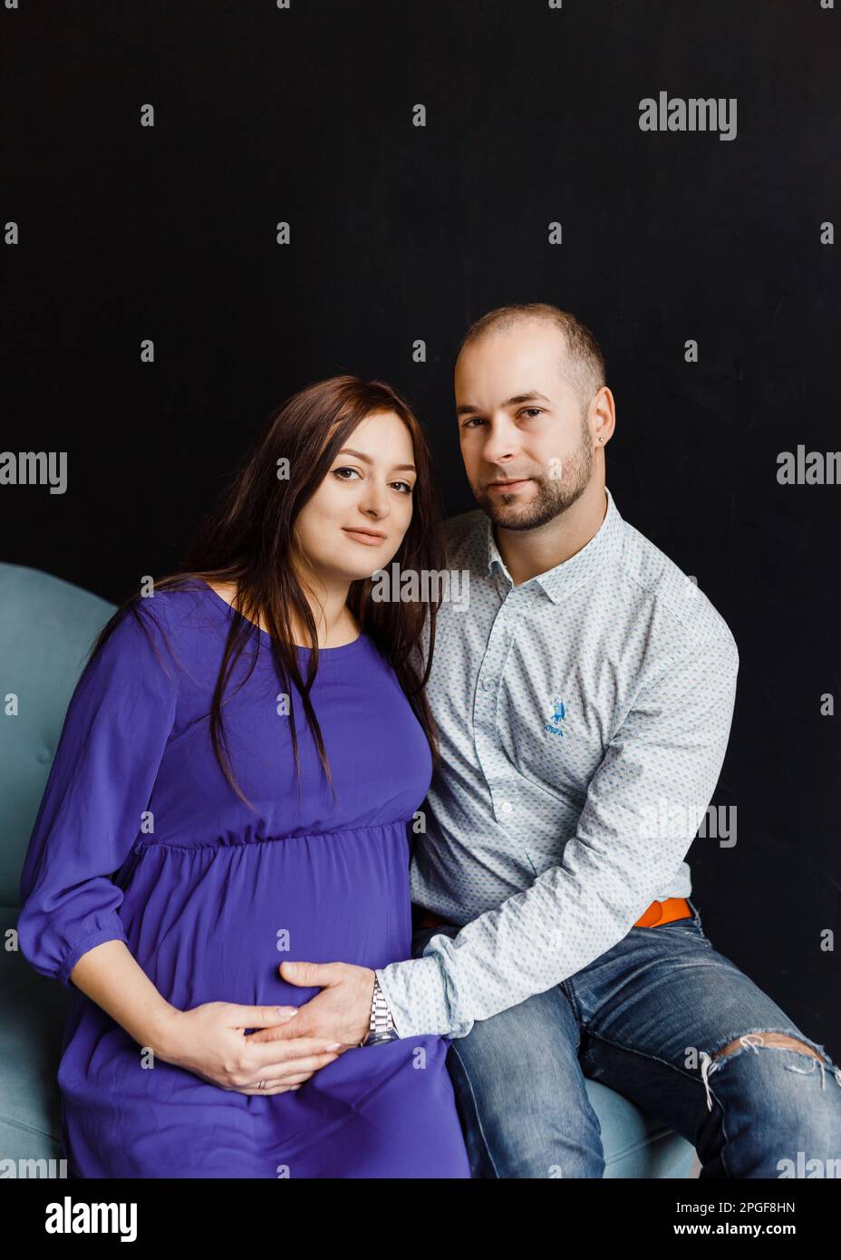 couple expecting a child is experiencing a happy period of pregnancy ...