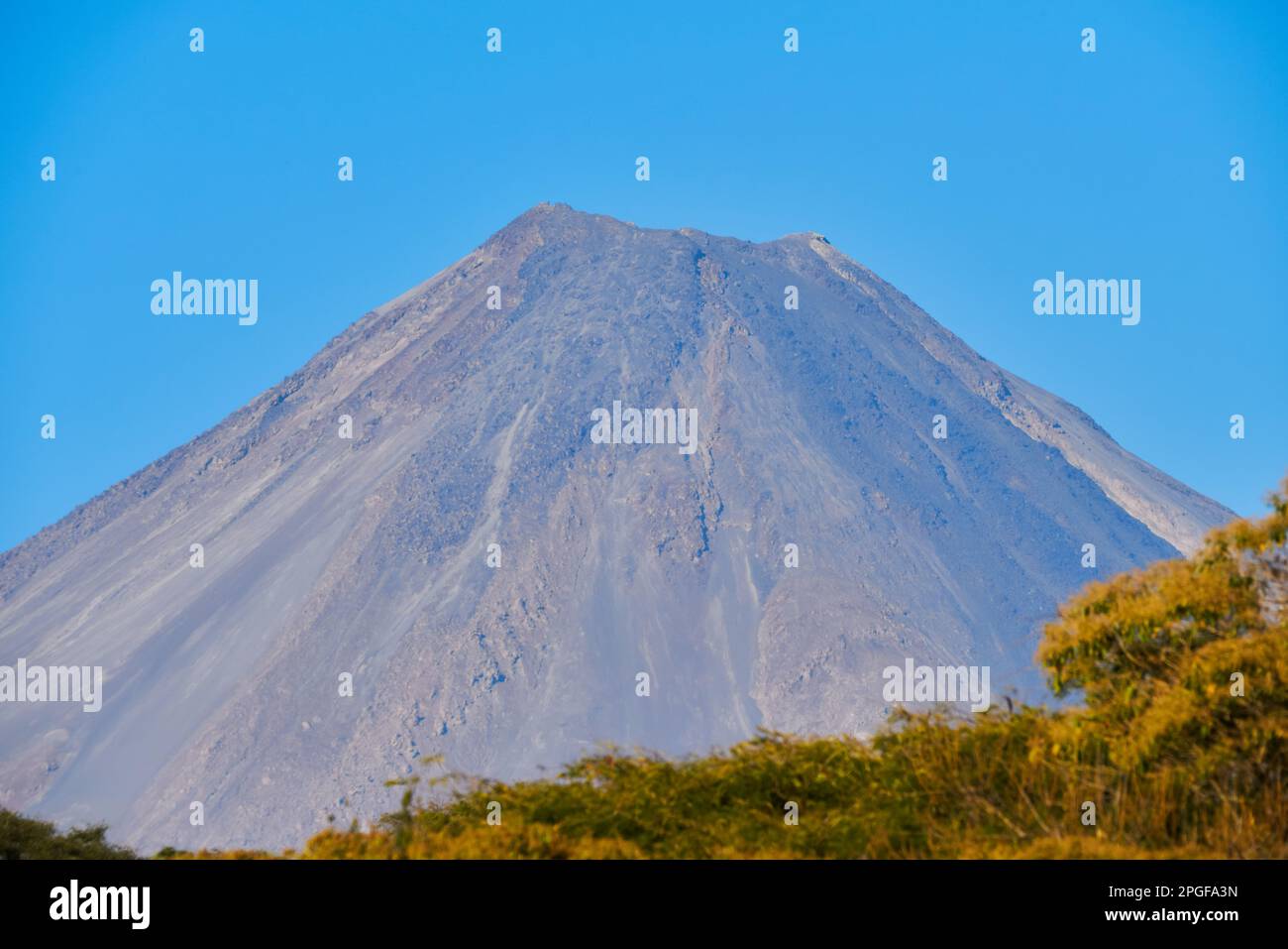 Nevado de Colima and Colima volcano together in a clear sky Stock Photo ...