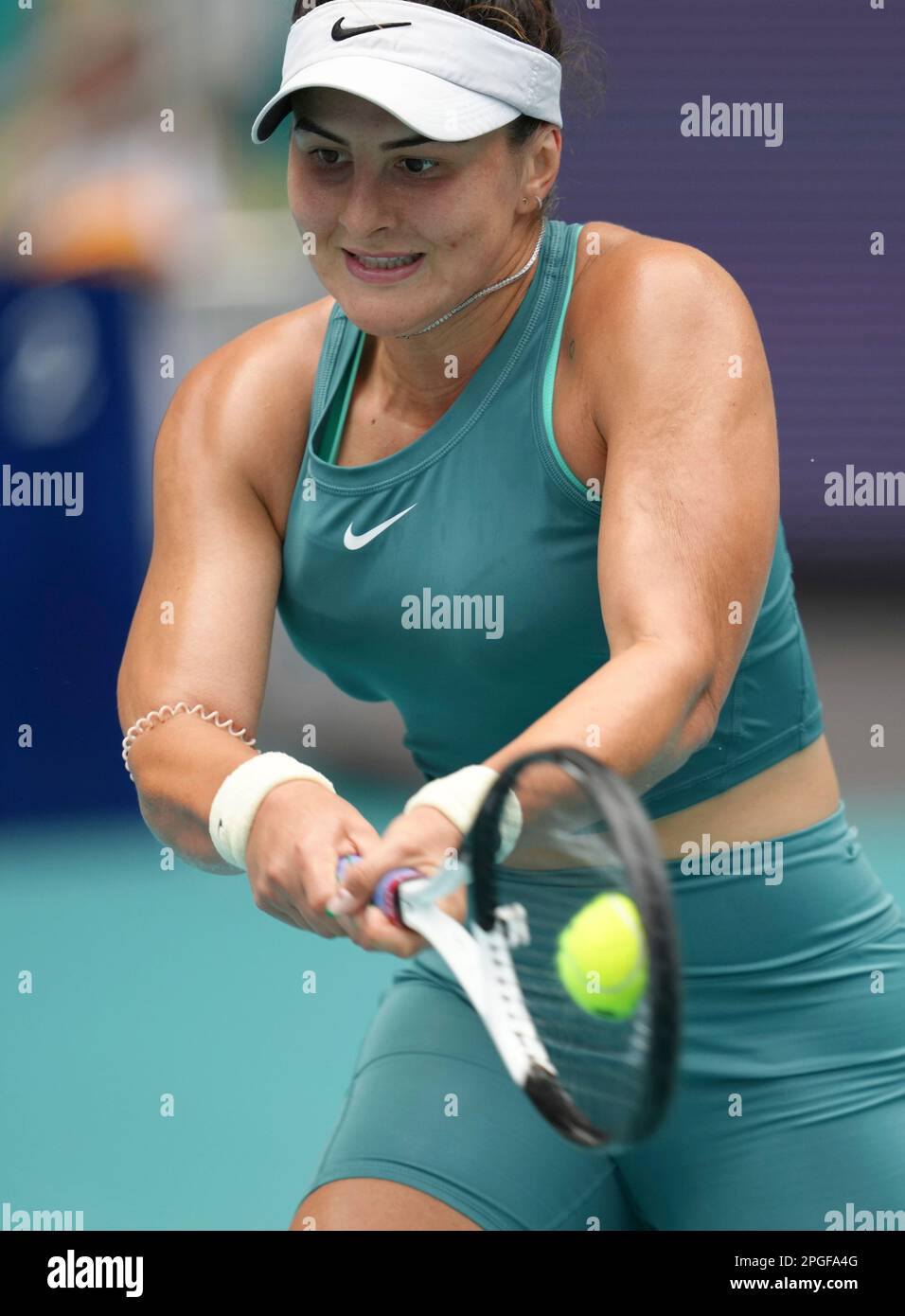 Bianca Andreescu, of Canada, returns a volley from Emma Raducanu, of ...
