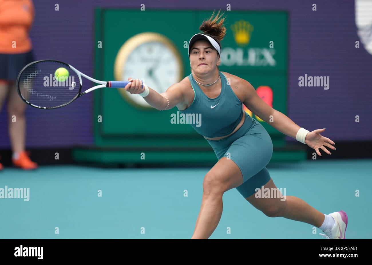 Bianca Andreescu, of Canada, returns a volley from Emma Raducanu, of ...