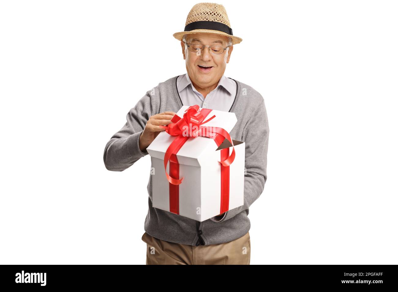 Senior man opening a present box isolated on white background Stock ...