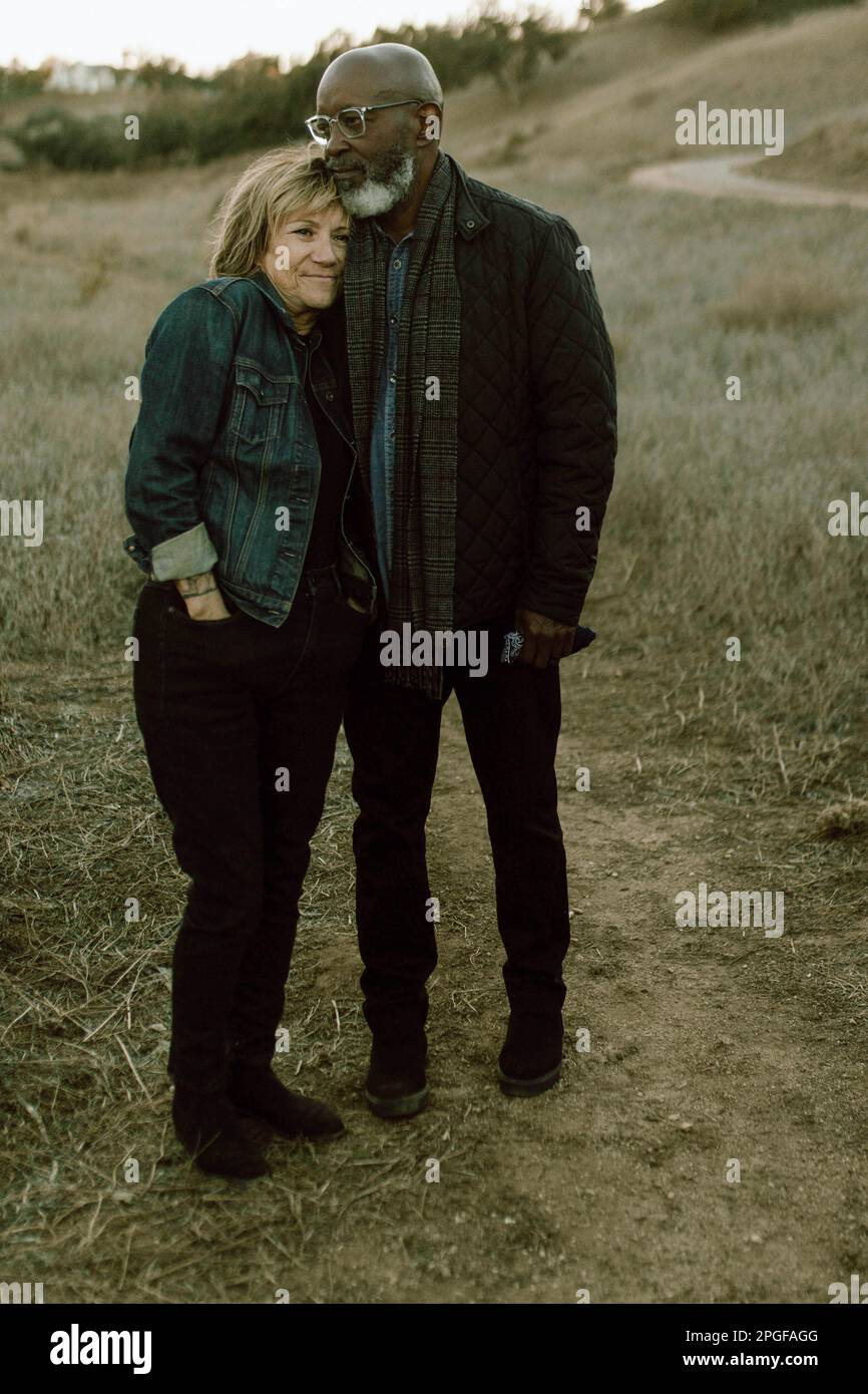 older interracial married couple special moment Stock Photo - Alamy