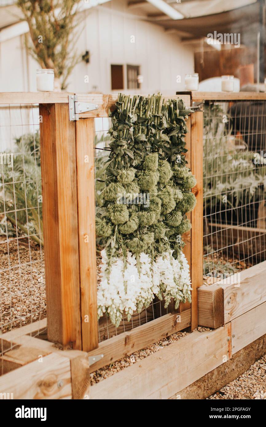 Flower arrangement at wedding handfasting altar Stock Photo - Alamy