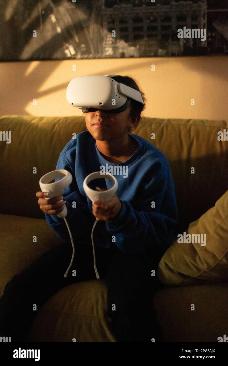 New technology teenager playing VR headset Stock Photo - Alamy