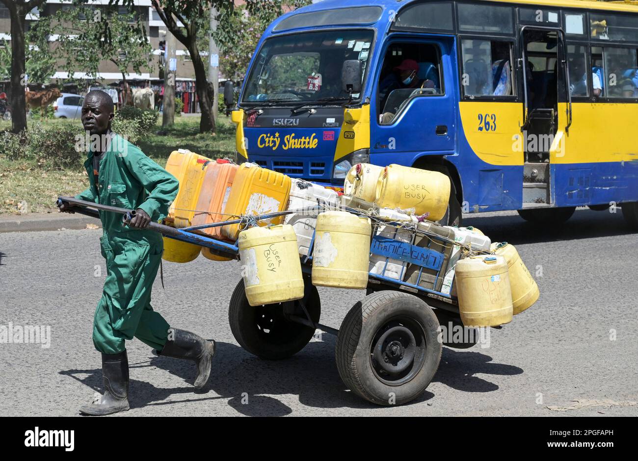 KENYA, Nairobi, traffic, mini bus Matatu and man-powered water ...