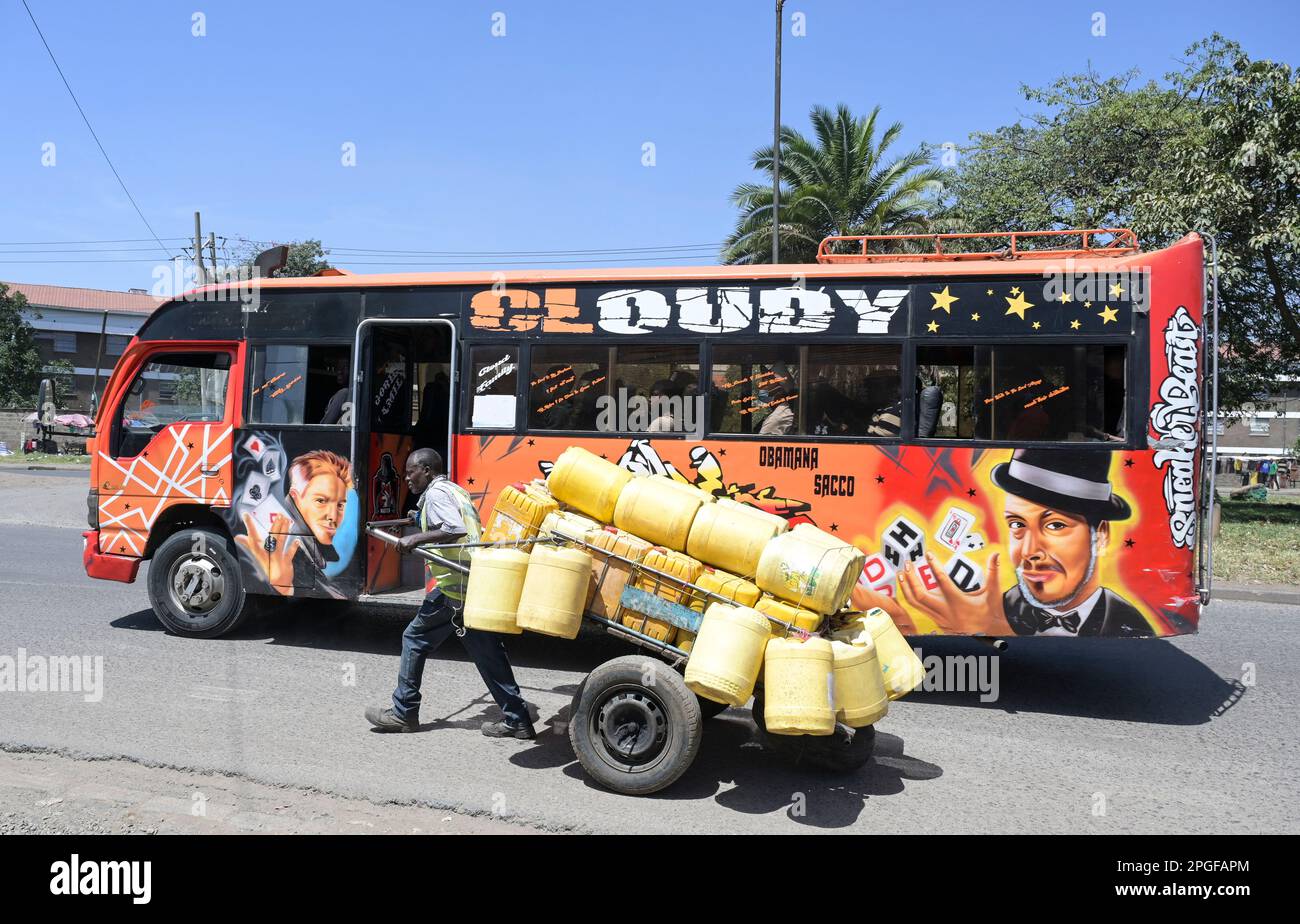 KENYA, Nairobi, traffic, mini bus Matatu and man-powered water ...