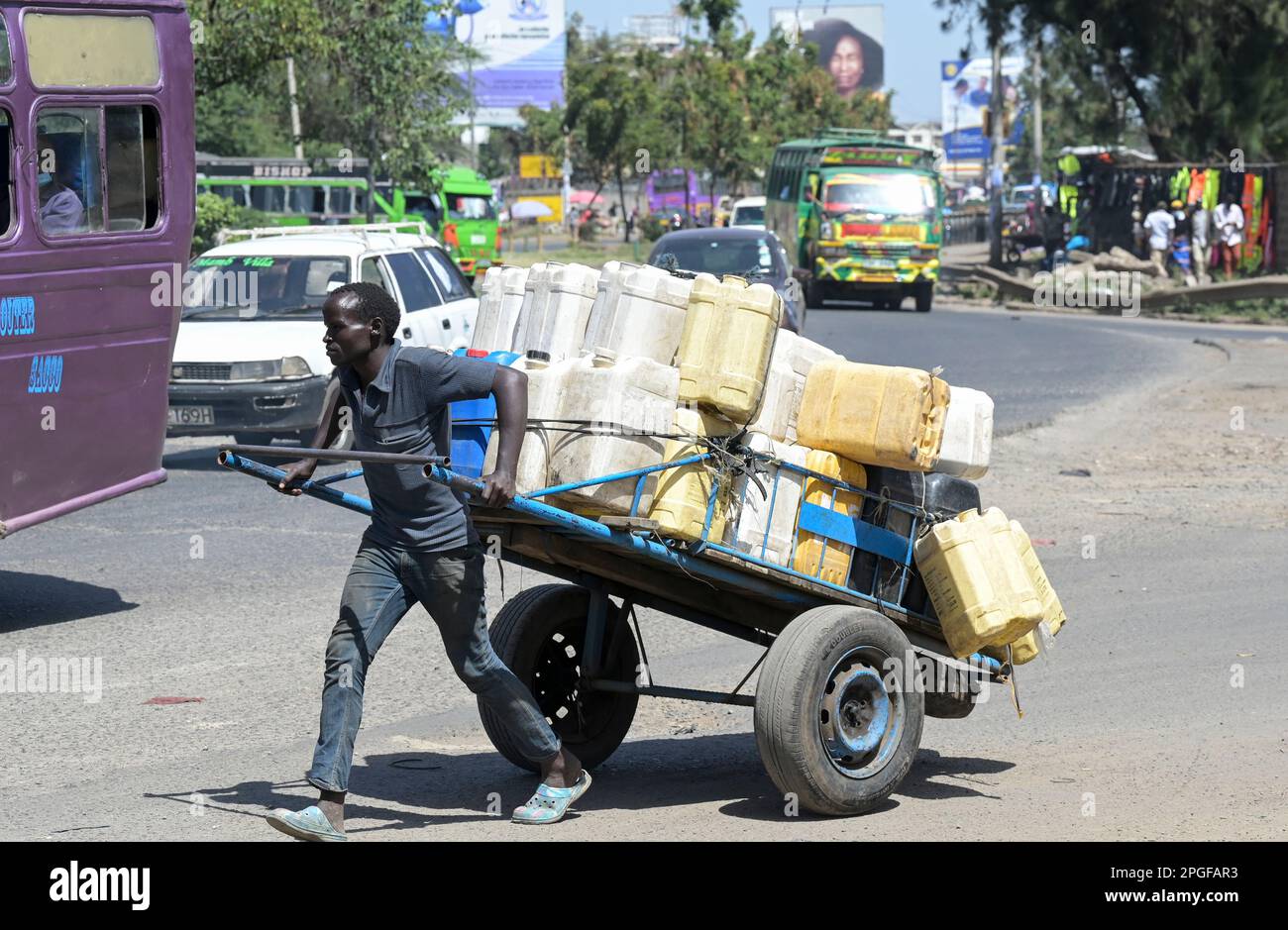 KENYA, Nairobi, traffic, mini bus Matatu and man-powered water ...