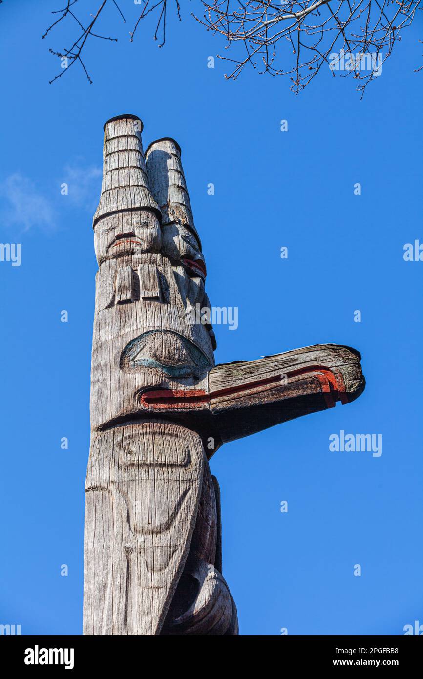 View of the upper section of a totem pole on the grounds of the BC ...