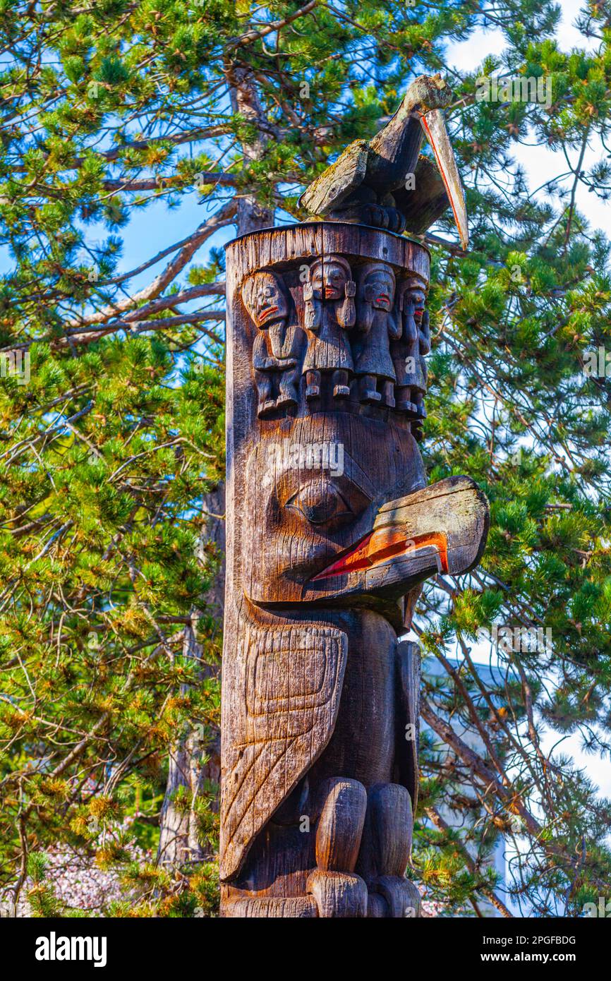 View of the upper section of a totem pole on the grounds of the BC ...