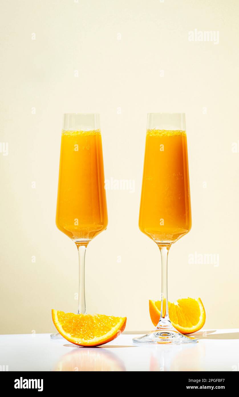 Mimosa alcohol cocktail drink with orange juice and cold dry champagne ...