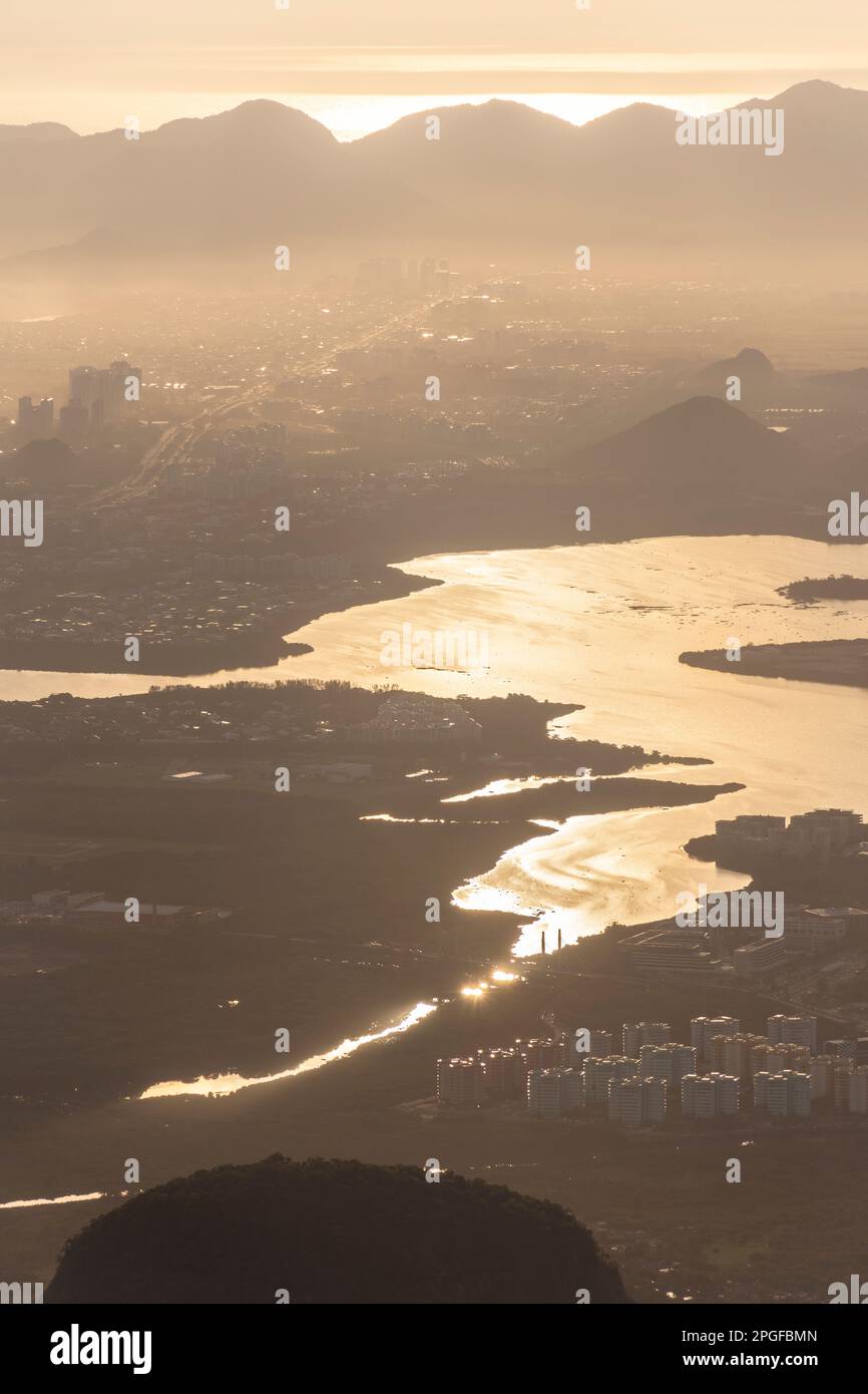 Beautiful sunset view to city lake and mountains from Bico do Papagaio ...