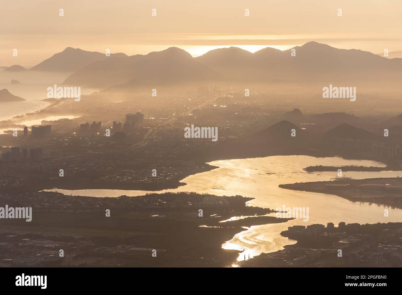 Beautiful sunset view to city lake and mountains from Bico do Papagaio ...