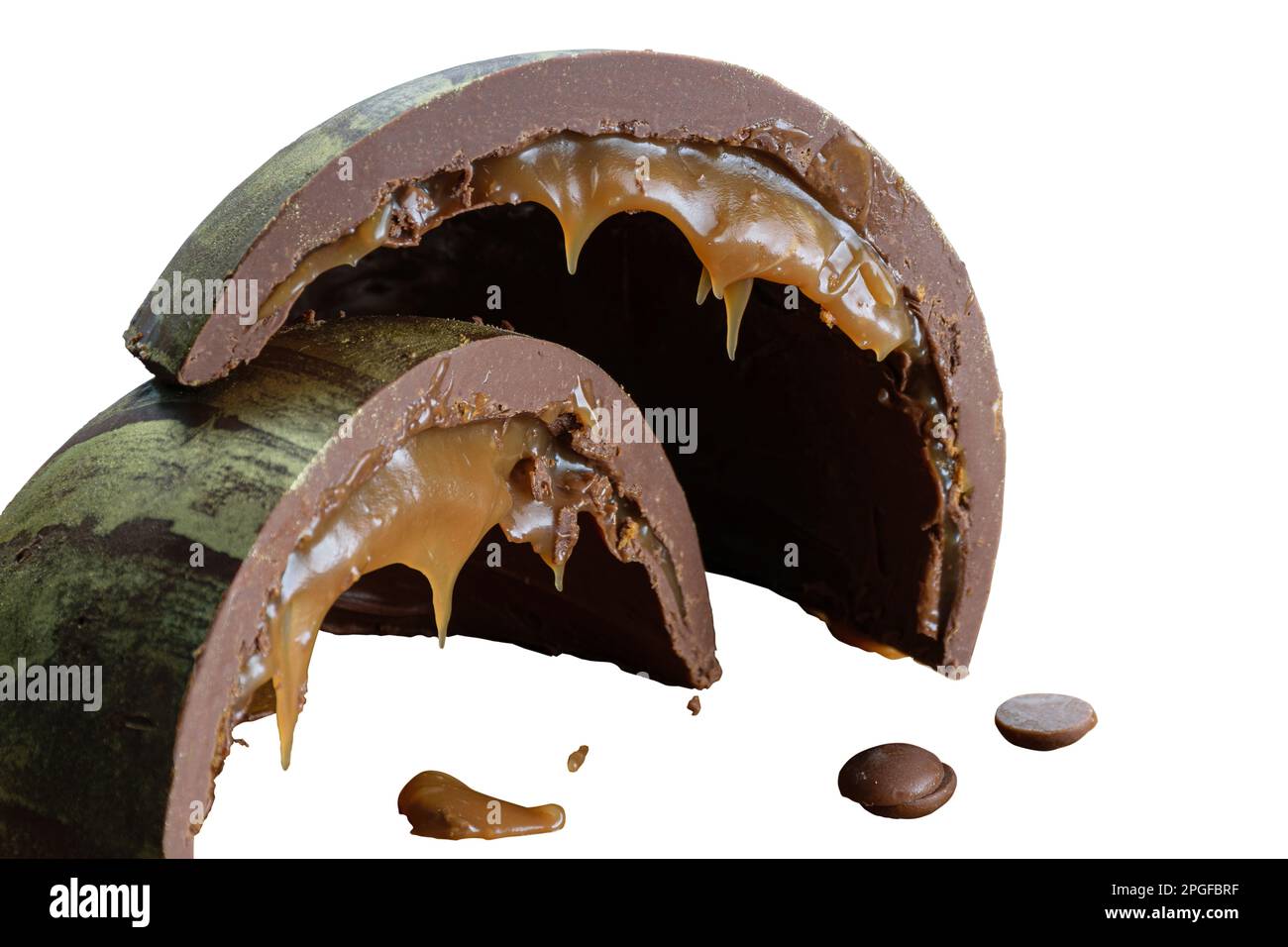 Closeup of a half of a cut, double-shelled Easter egg stuffed with ...