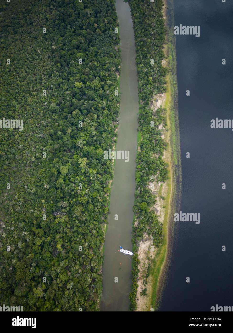 Beautiful top down drone view to large rivers and white tour boat Stock ...