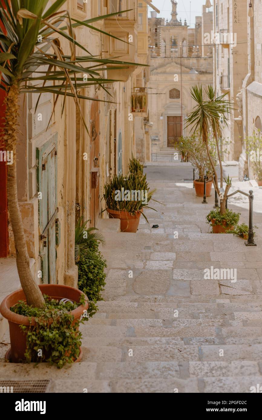 Beautiful walkway along an ancient city in Malta Stock Photo - Alamy