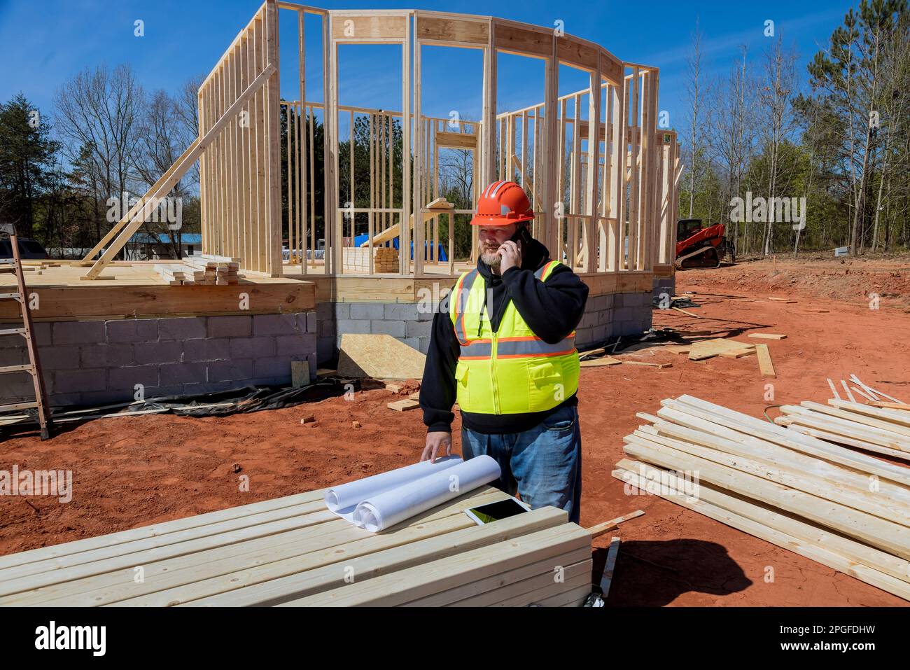 During construction process inspector inspects work being done on site ...