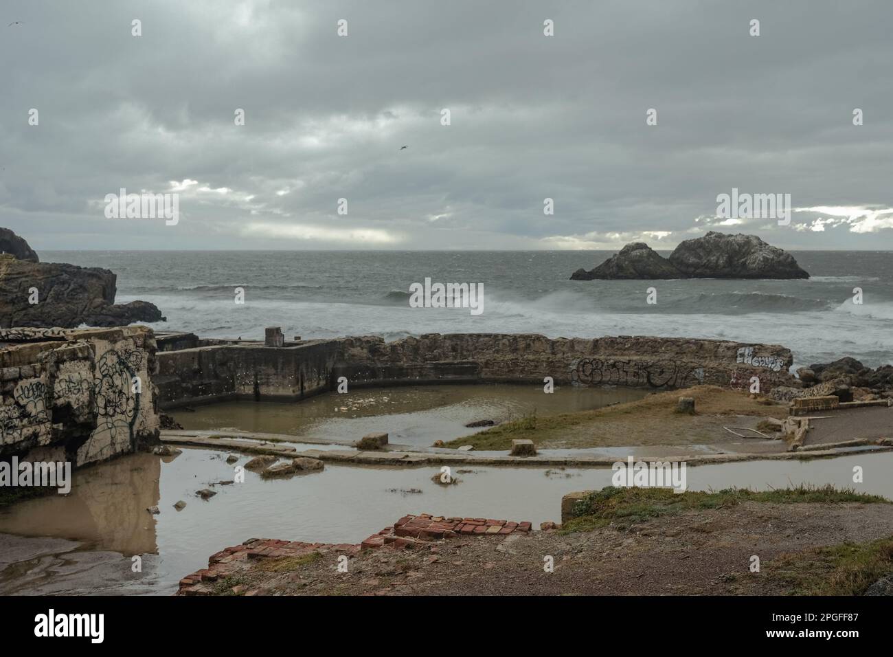 A general view of the Sutro Baths ruins perched on the rocky shoreline ...