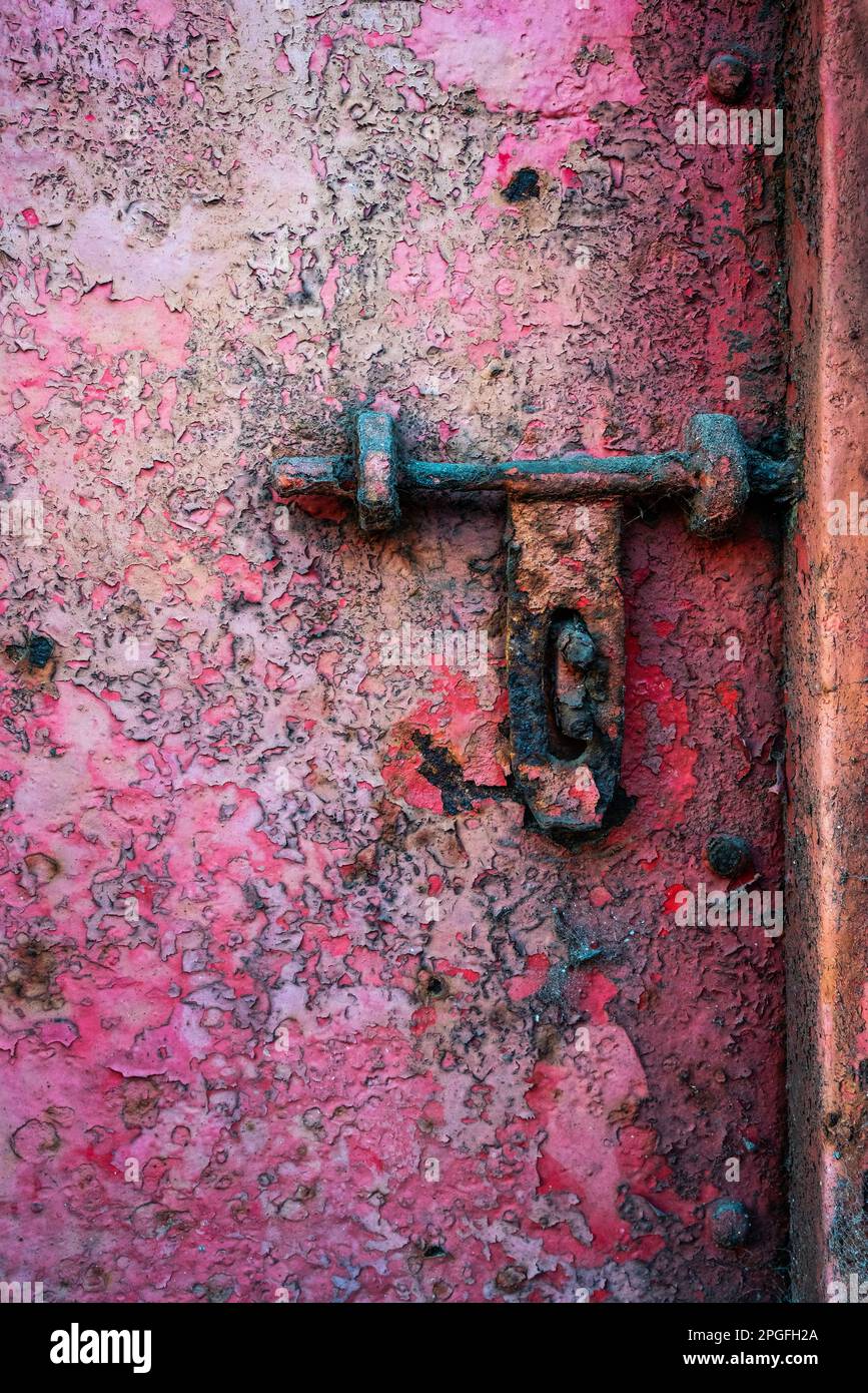 Rusted steel door with peeling paint Stock Photo - Alamy