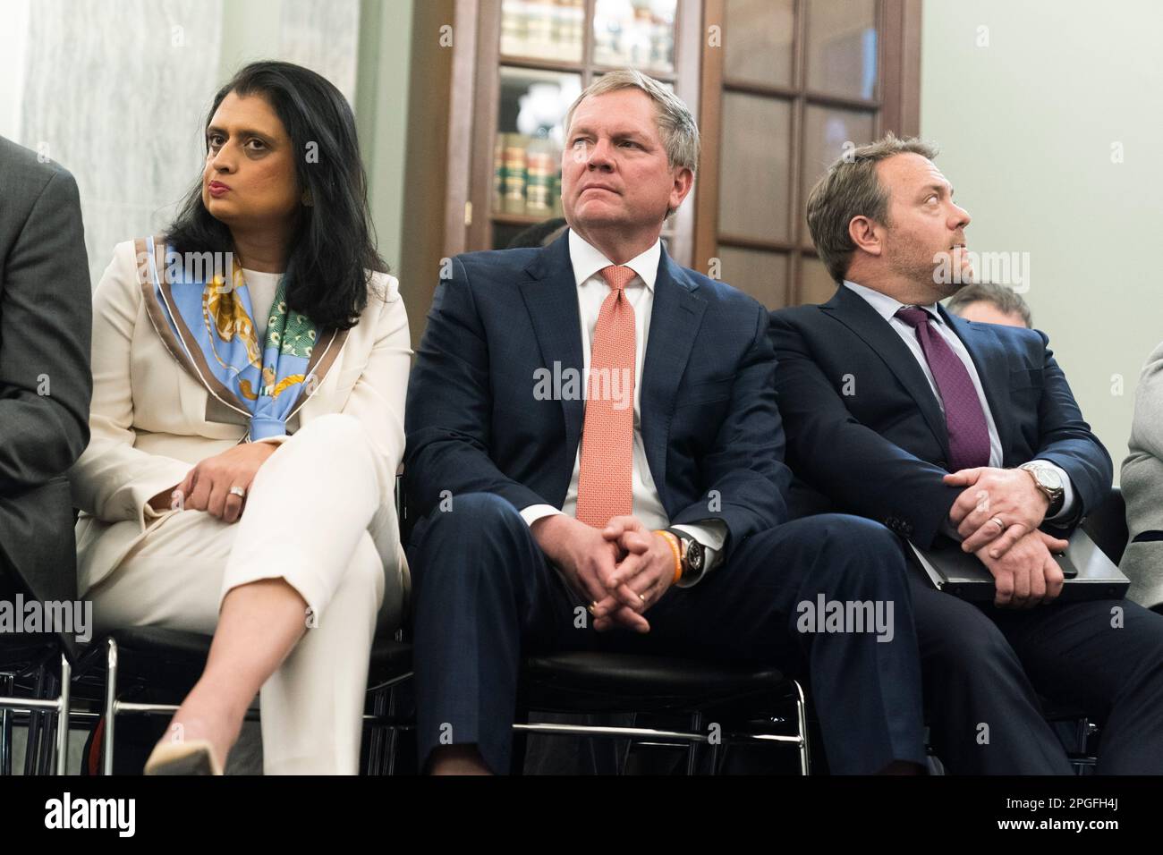 Norfolk Southern CEO Alan Shaw, center, watches, before being called to ...