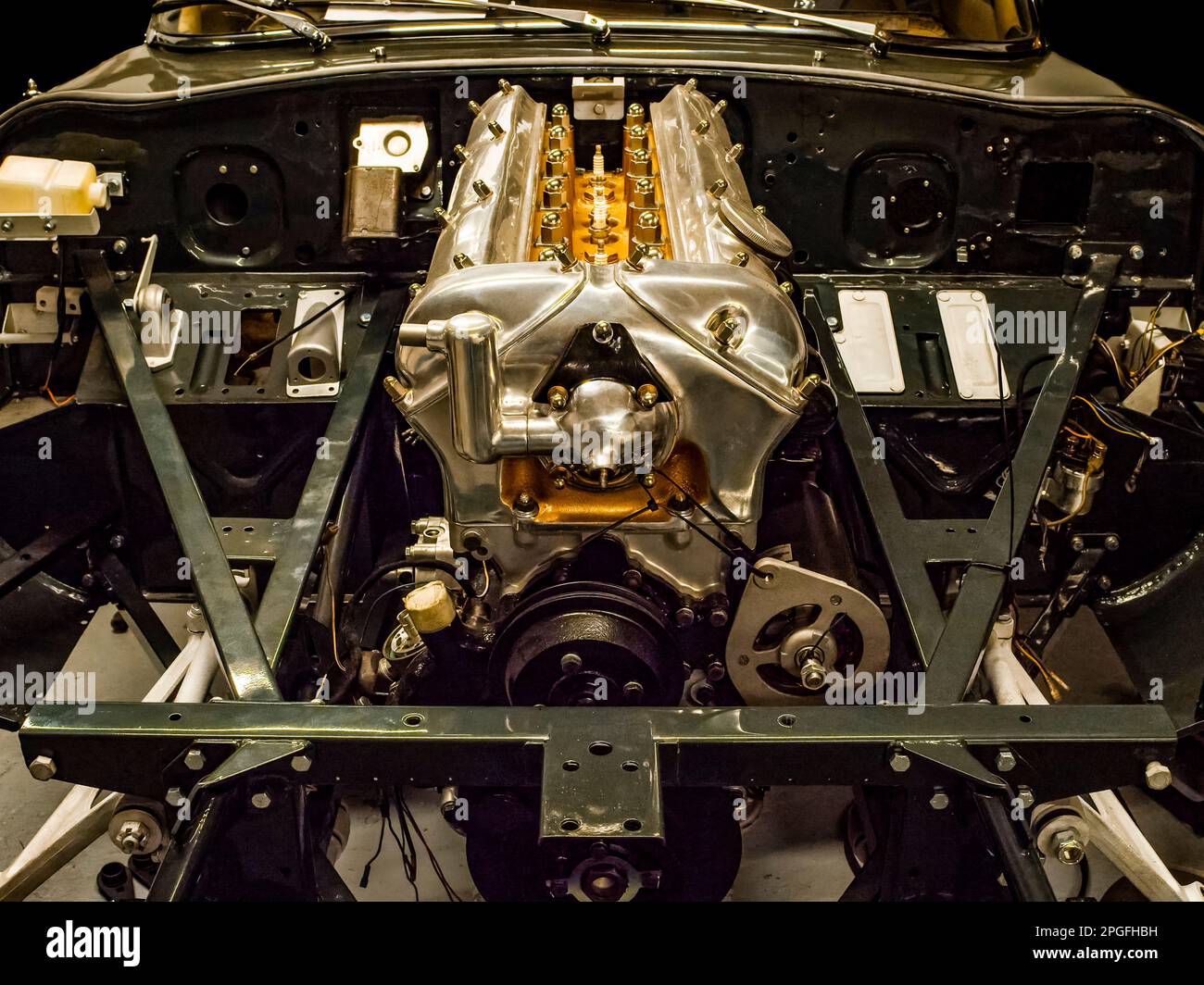 Restored engine for a Jaguar E-Type classic sports car fitted within ...