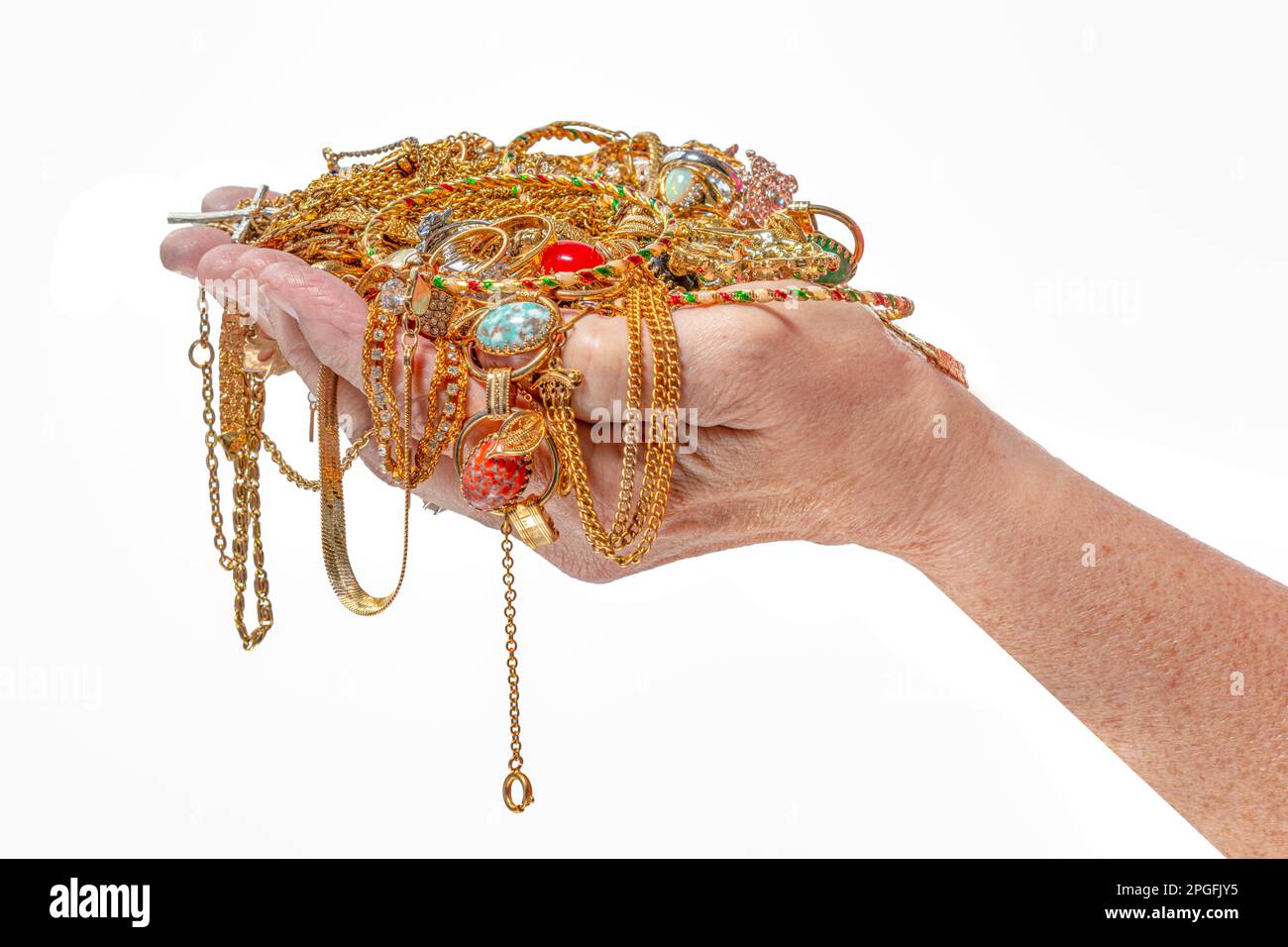 Handful of gold hi-res stock photography and images - Alamy