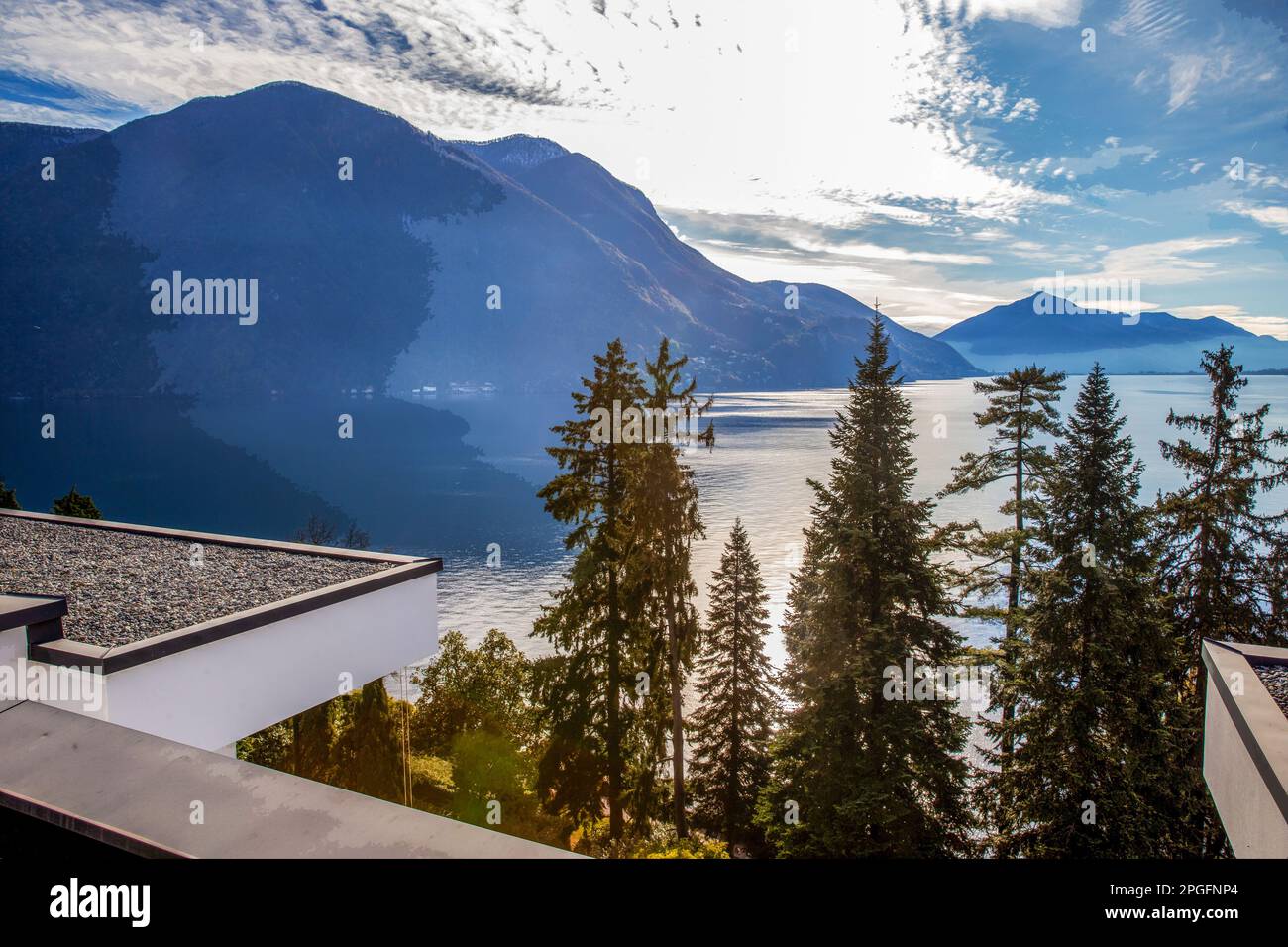 Lake Lugano from Olive trail : modern 4 storey apartment building on ...
