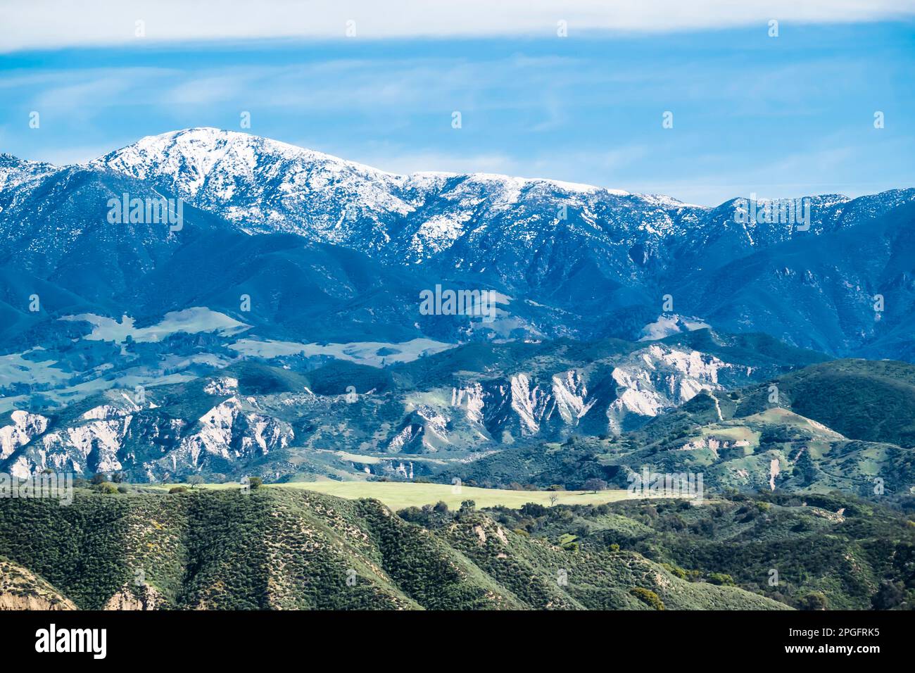 The snow covered peaks of the Santa Ynez mountains in winter after an ...