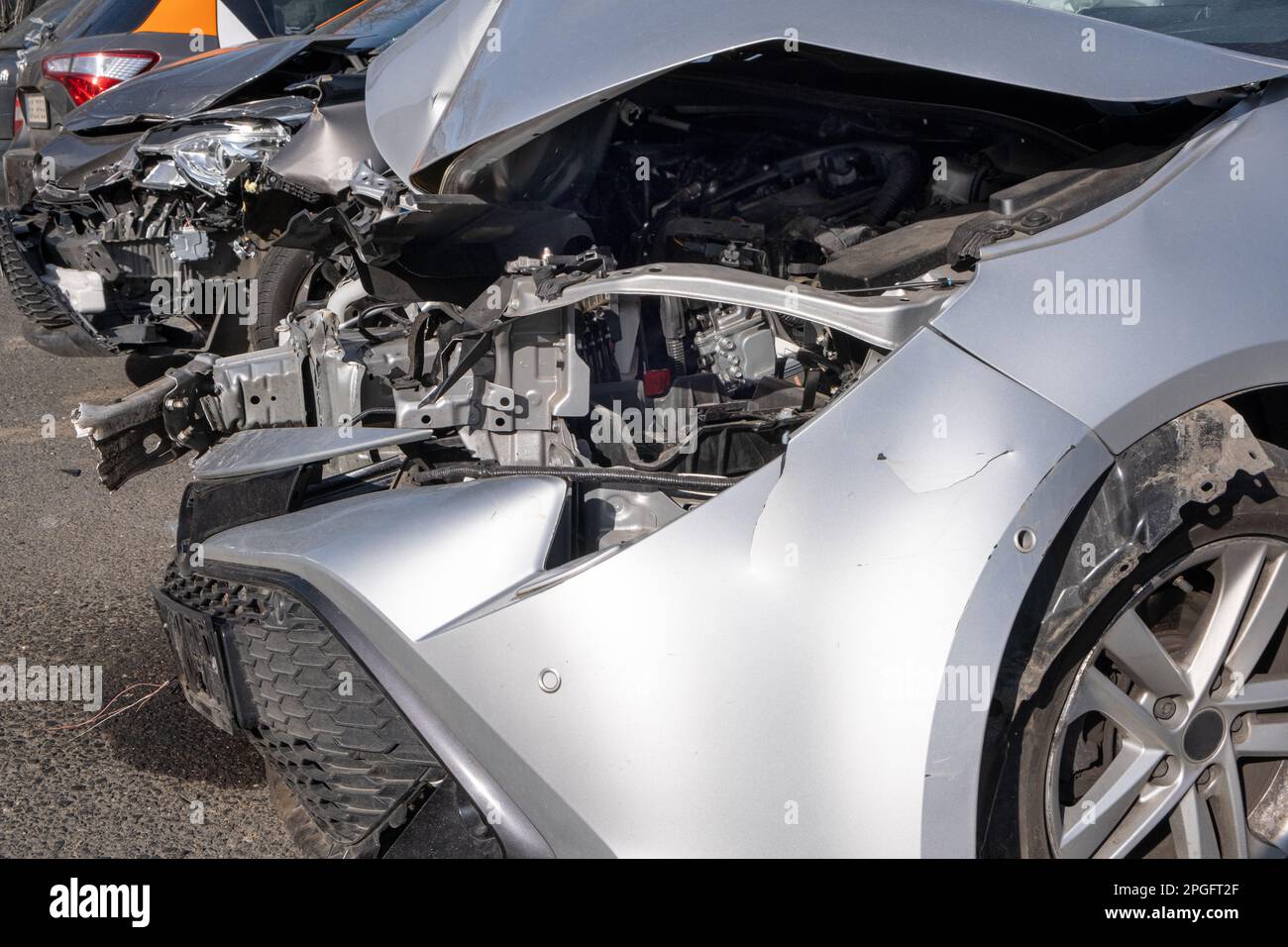 Dented Car front bumper and light lamp. Crashed metall on private car ...