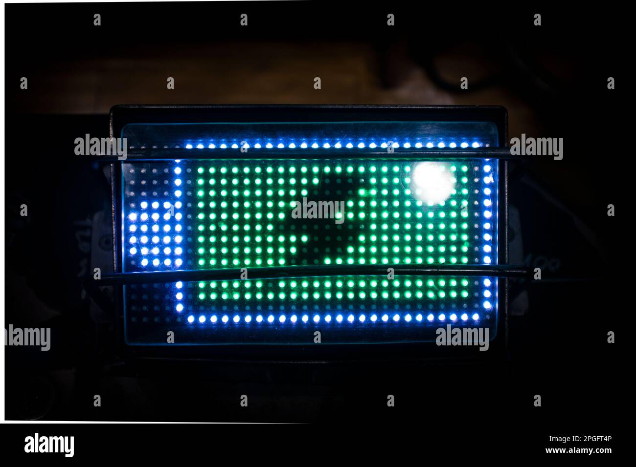 Green full loaded and charged battery draw on a neon light screen ...